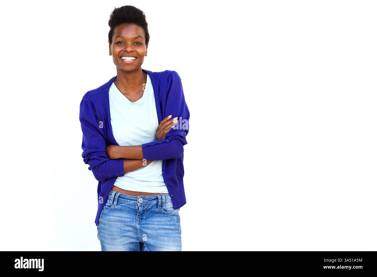 Portrait of stylish young african female model standing with arms ...