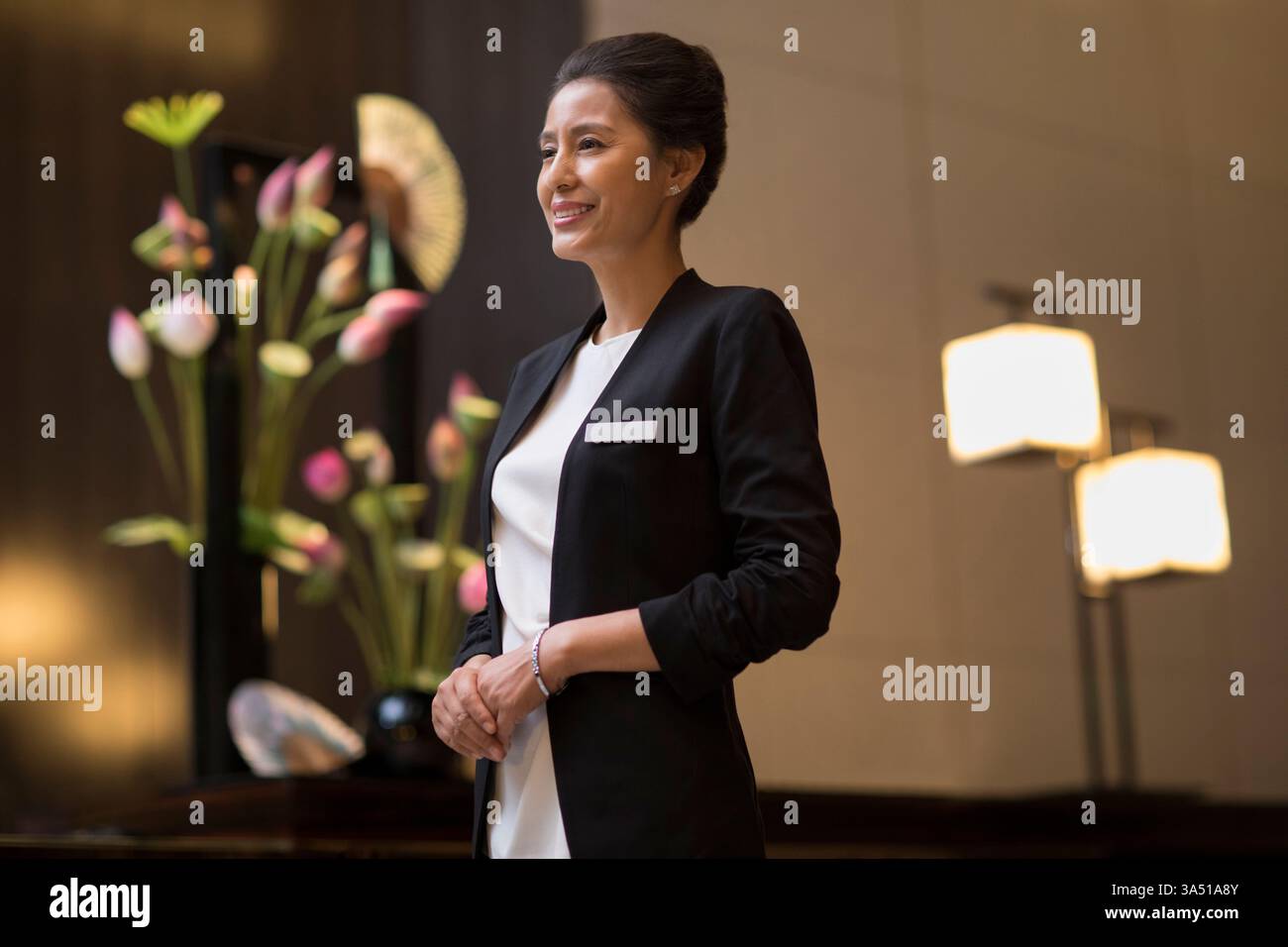 Asian hotel manager 50s hi-res stock photography and images - Alamy