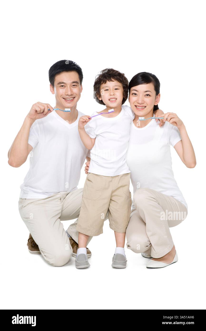 Chinese family brushing teeth Stock Photo - Alamy