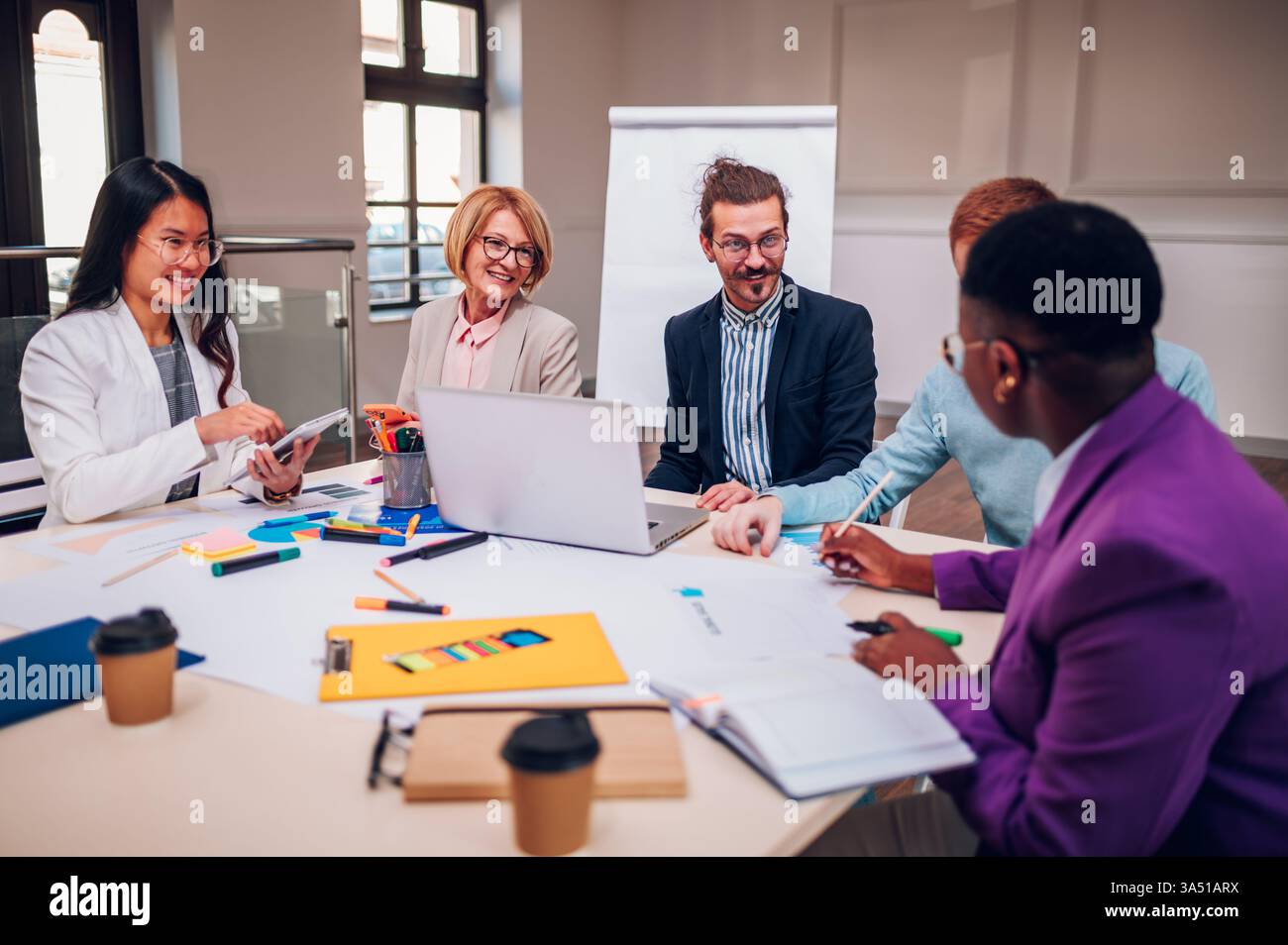 Diverse office people group talking and enjoying teamwork during staff ...