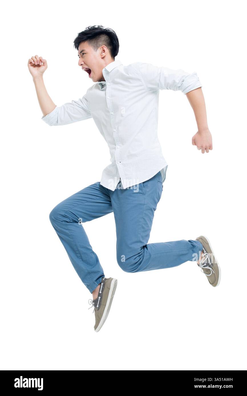 Young Chinese man running Stock Photo - Alamy