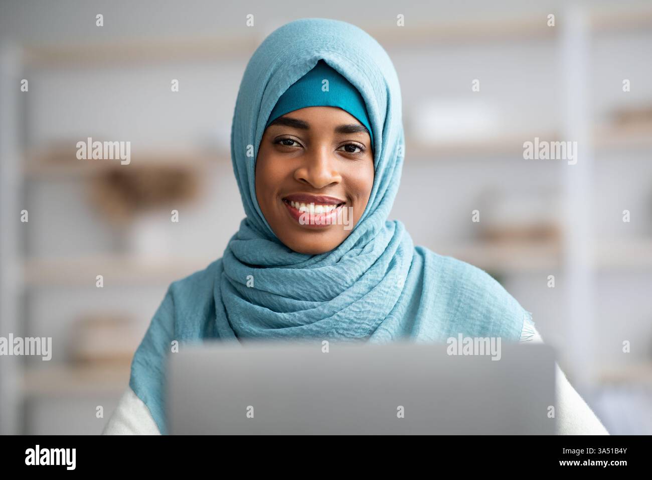Closeup Portrait Of Black Islamic Freelancer Lady In Hijab Using Laptop ...