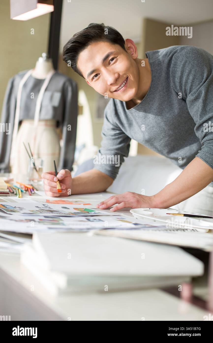 Male designer drawing model sketch hi-res stock photography and images - Alamy