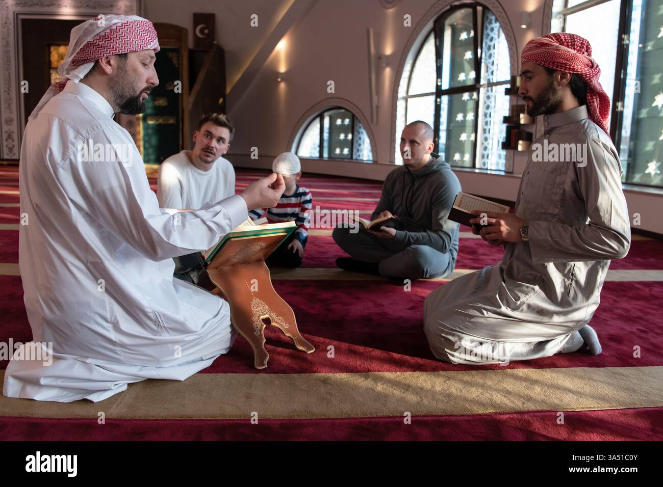 muslim people in mosque reading quran together concept of islamic ...