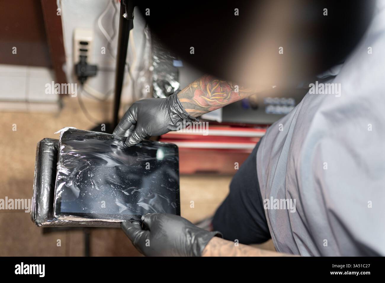 Tattoo artist starting work hi-res stock photography and images - Alamy