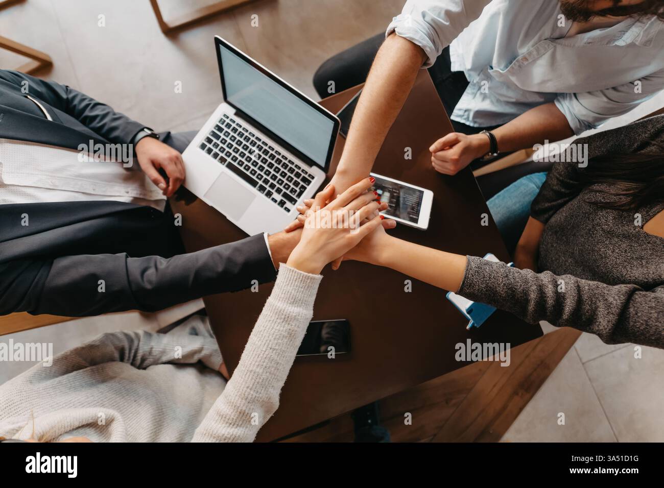 Young professionals gathered collaborative hi-res stock photography and ...