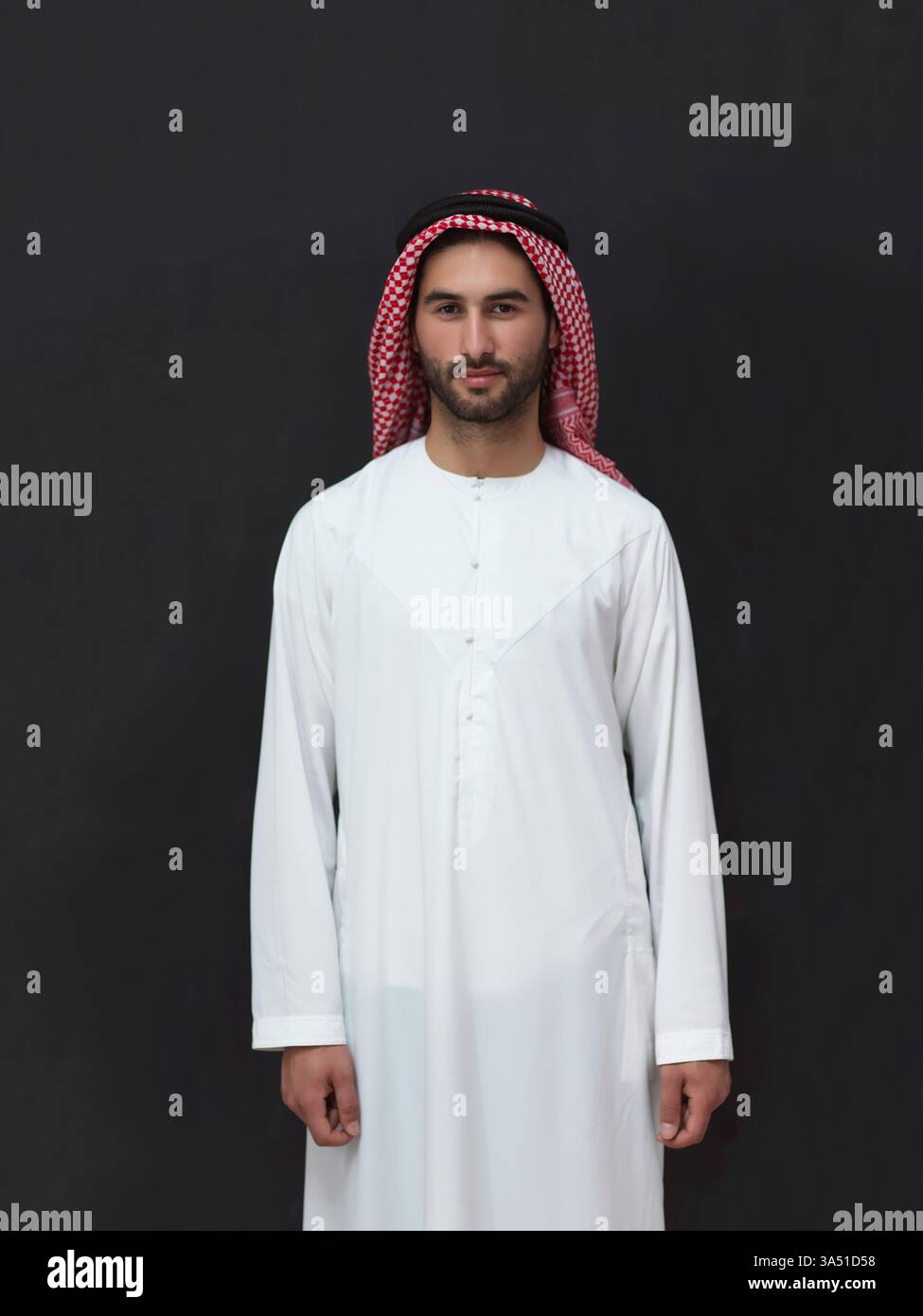 Portrait of young muslim man wearing traditional clothes. Happy Arab ...
