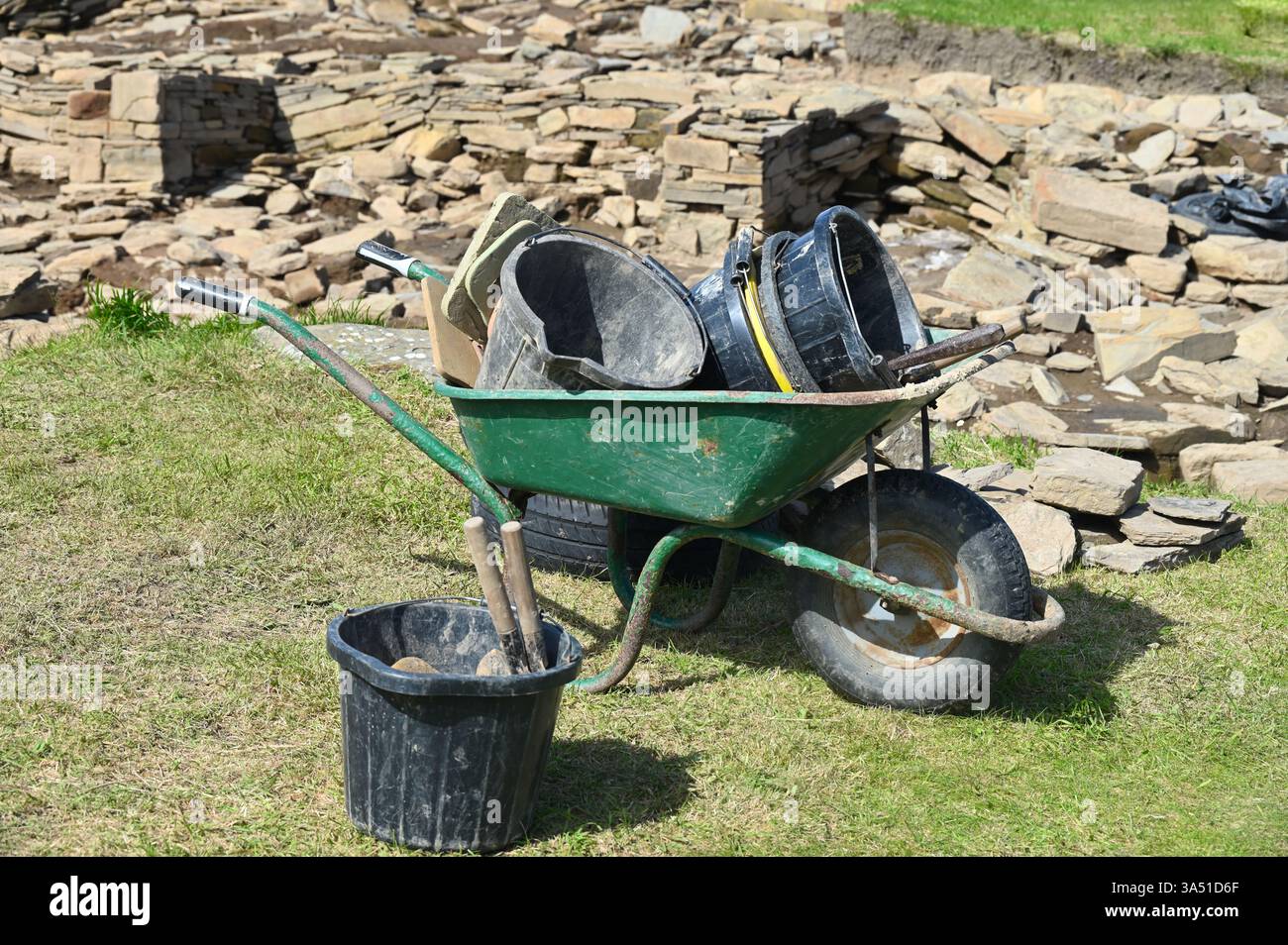 Wheelbarrow and buckets - archeologists equipment at Ness of Brodgar ...
