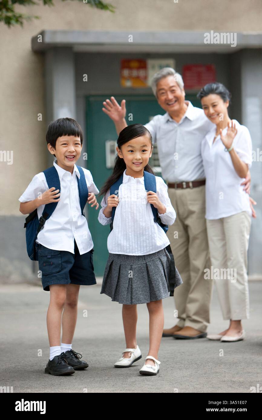 Child uniform waving hi-res stock photography and images - Alamy