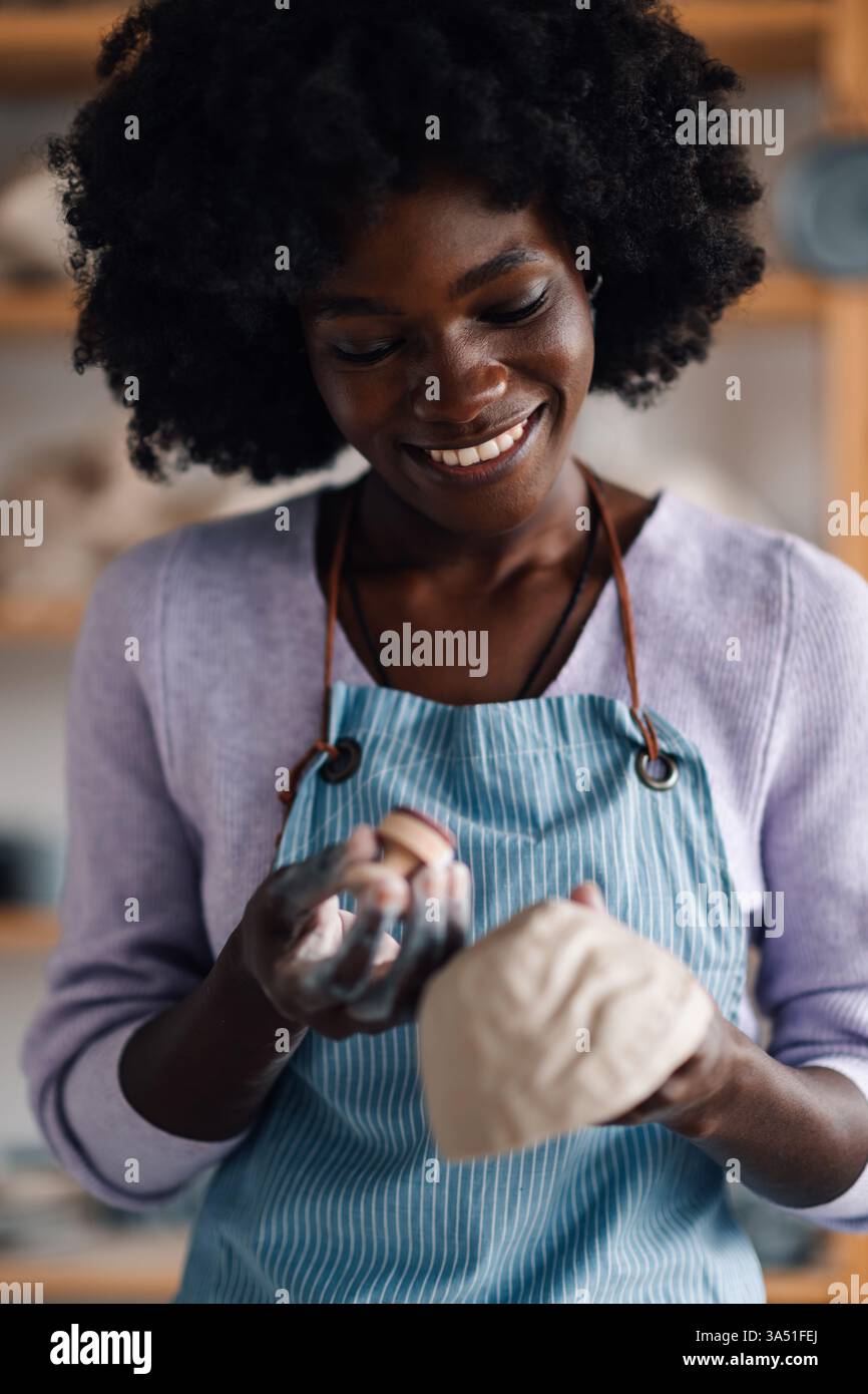 Portrait multicultural pottery class hi-res stock photography and ...