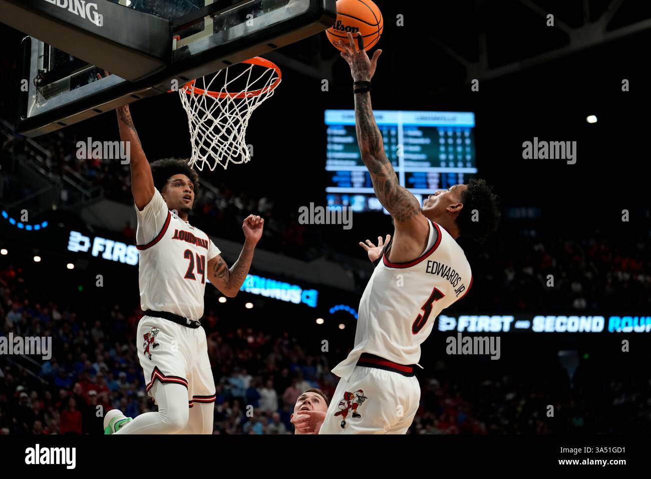 Louisville guard Terrence Edwards Jr. (5) shoots against Creighton ...