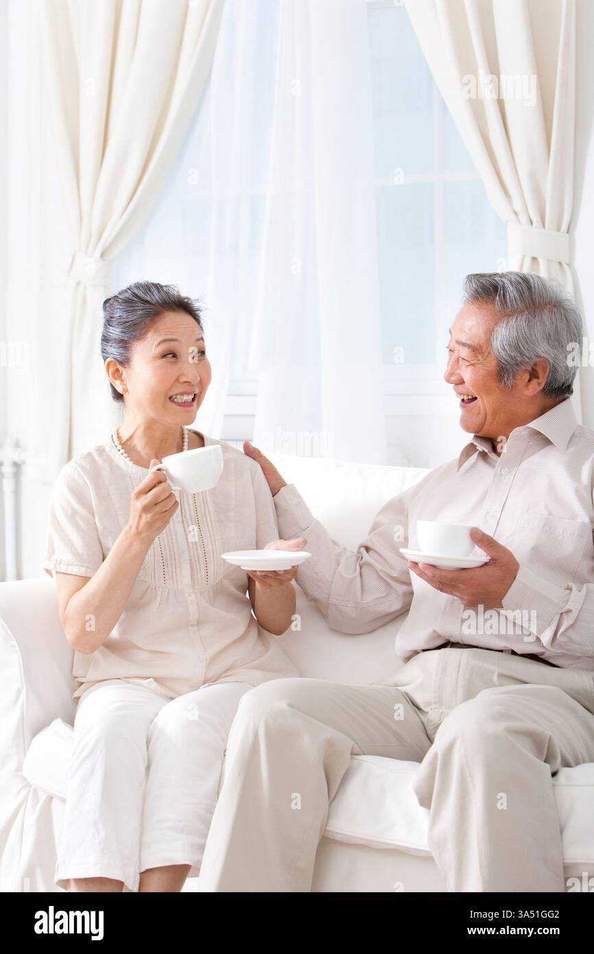 Laughing senior couples drinking hi-res stock photography and images ...