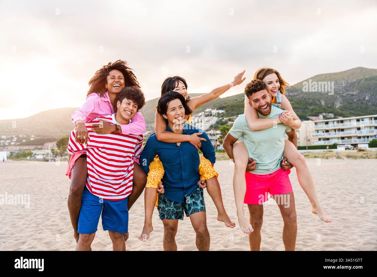 Group of young happy friends bonding outside, having fun on summertime ...