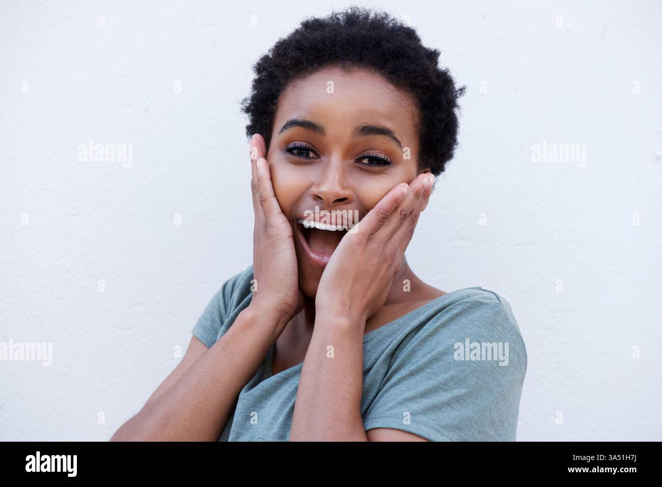 Surprised smiling attractive african woman hi-res stock photography and ...