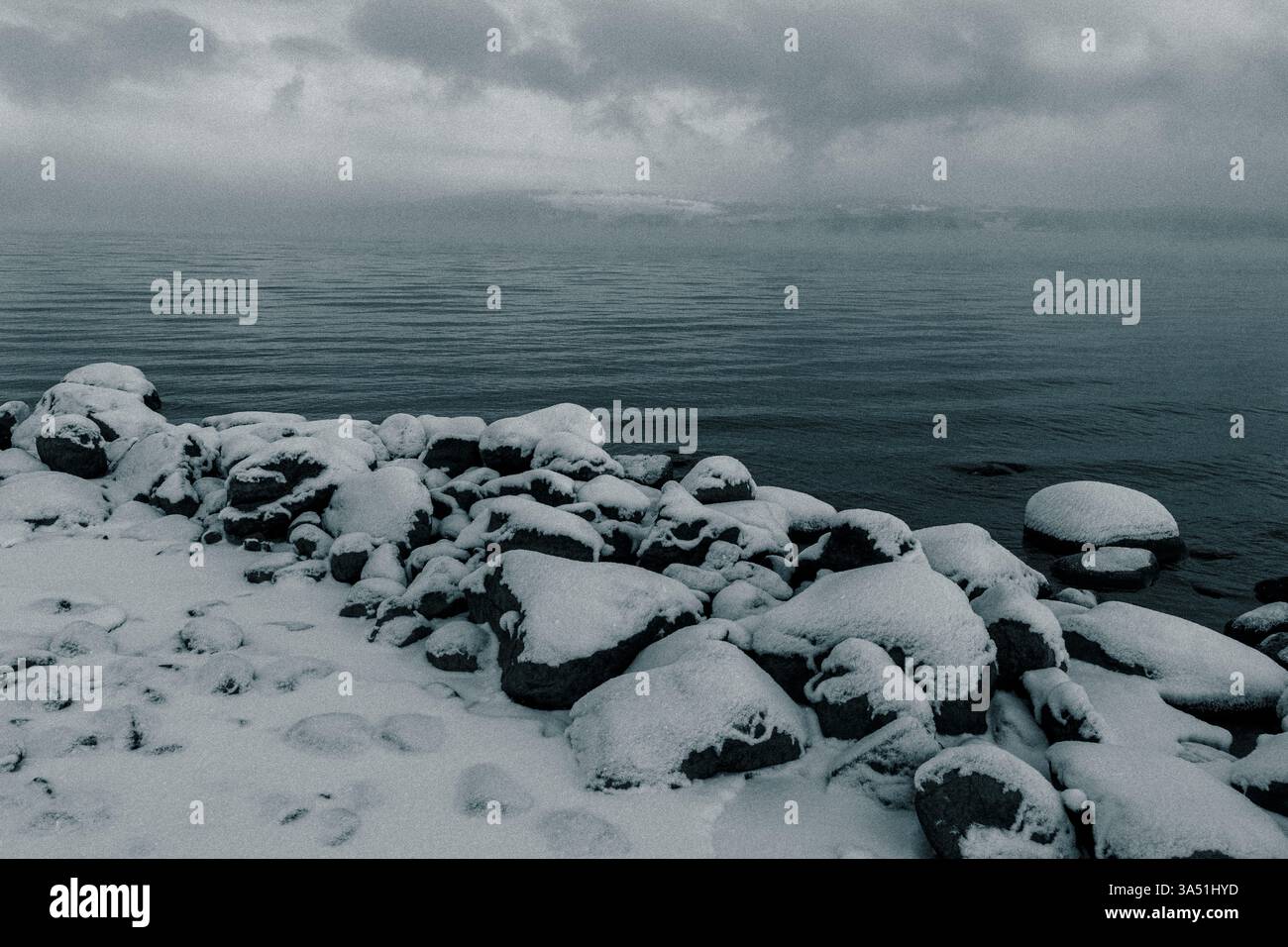 Rocks by Lake Mjøsa in winter Stock Photo - Alamy