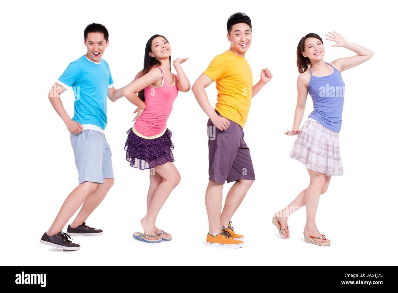 Cheerful young Chinese dancing Stock Photo - Alamy