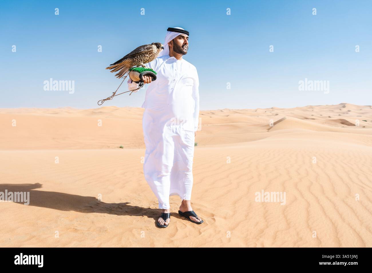 Middle-eastern man wearing traditional emirati arab kandura in the ...