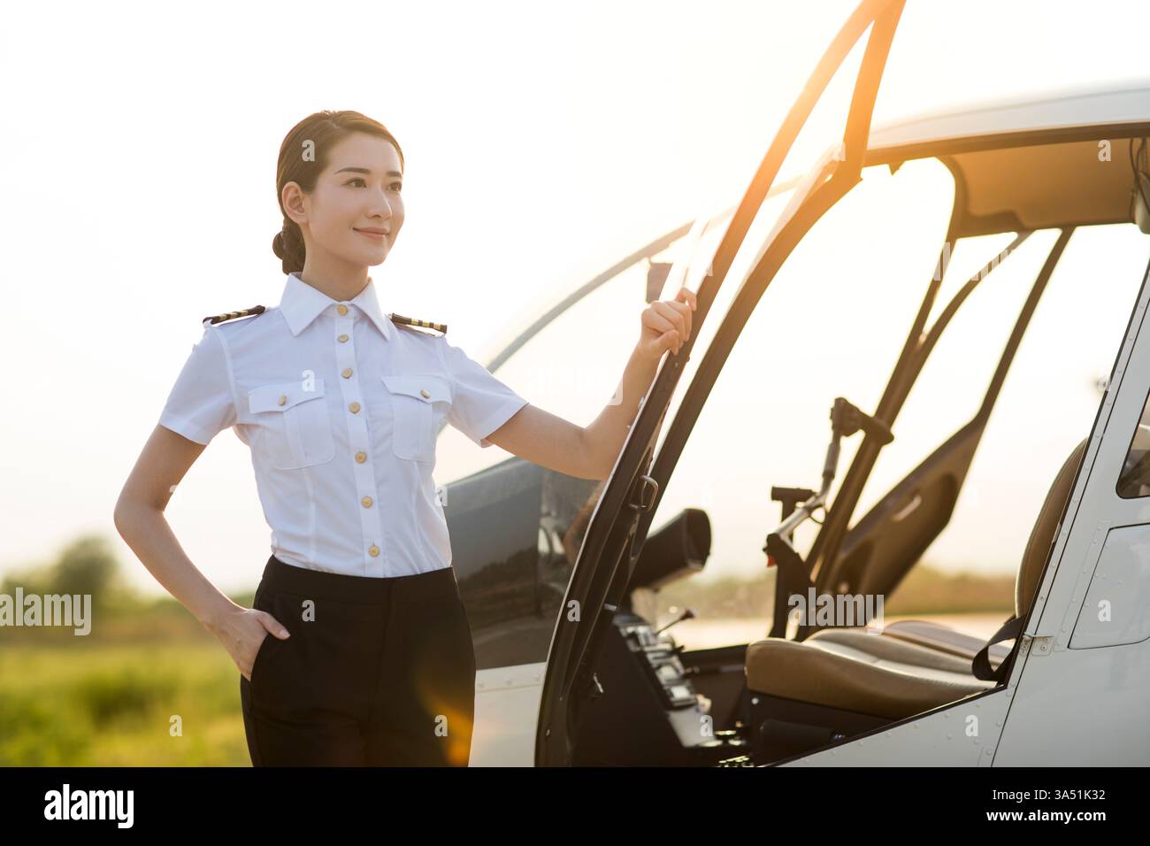 Female pilot in uniform standing hi-res stock photography and images ...