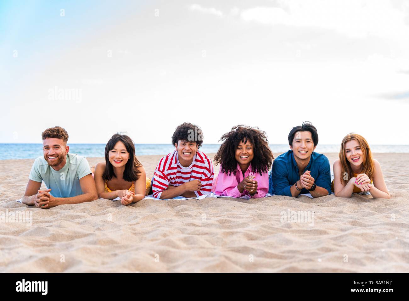 Group of young happy friends bonding outside, having fun on summertime ...