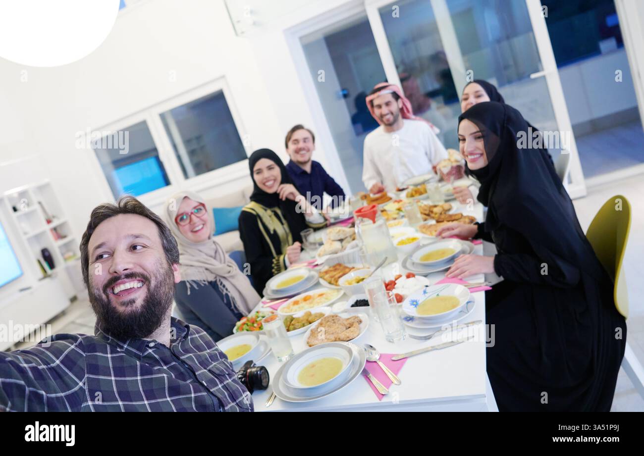 Eid Mubarak Muslim family having Iftar dinner taking pictures with ...
