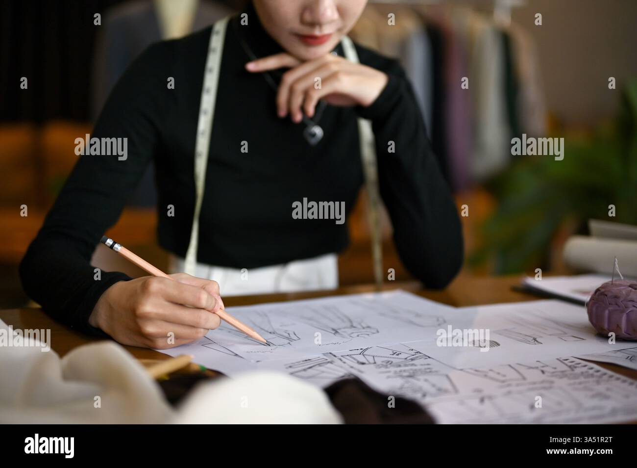 Close-up image of a professional Asian female fashion designer or ...