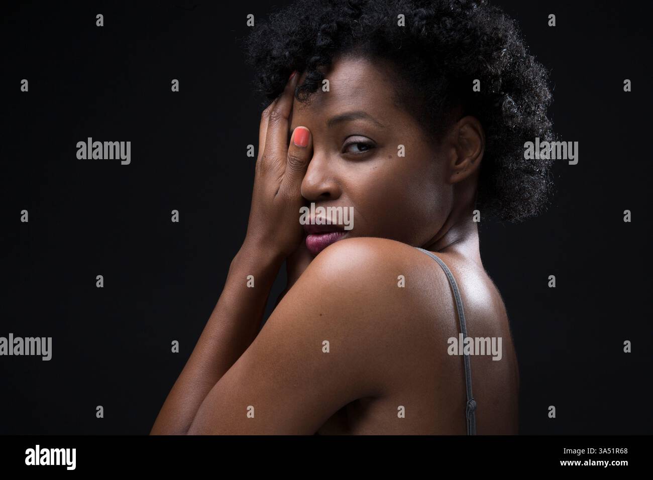 Serious Black woman deeply thinking praying meditating stressed ...