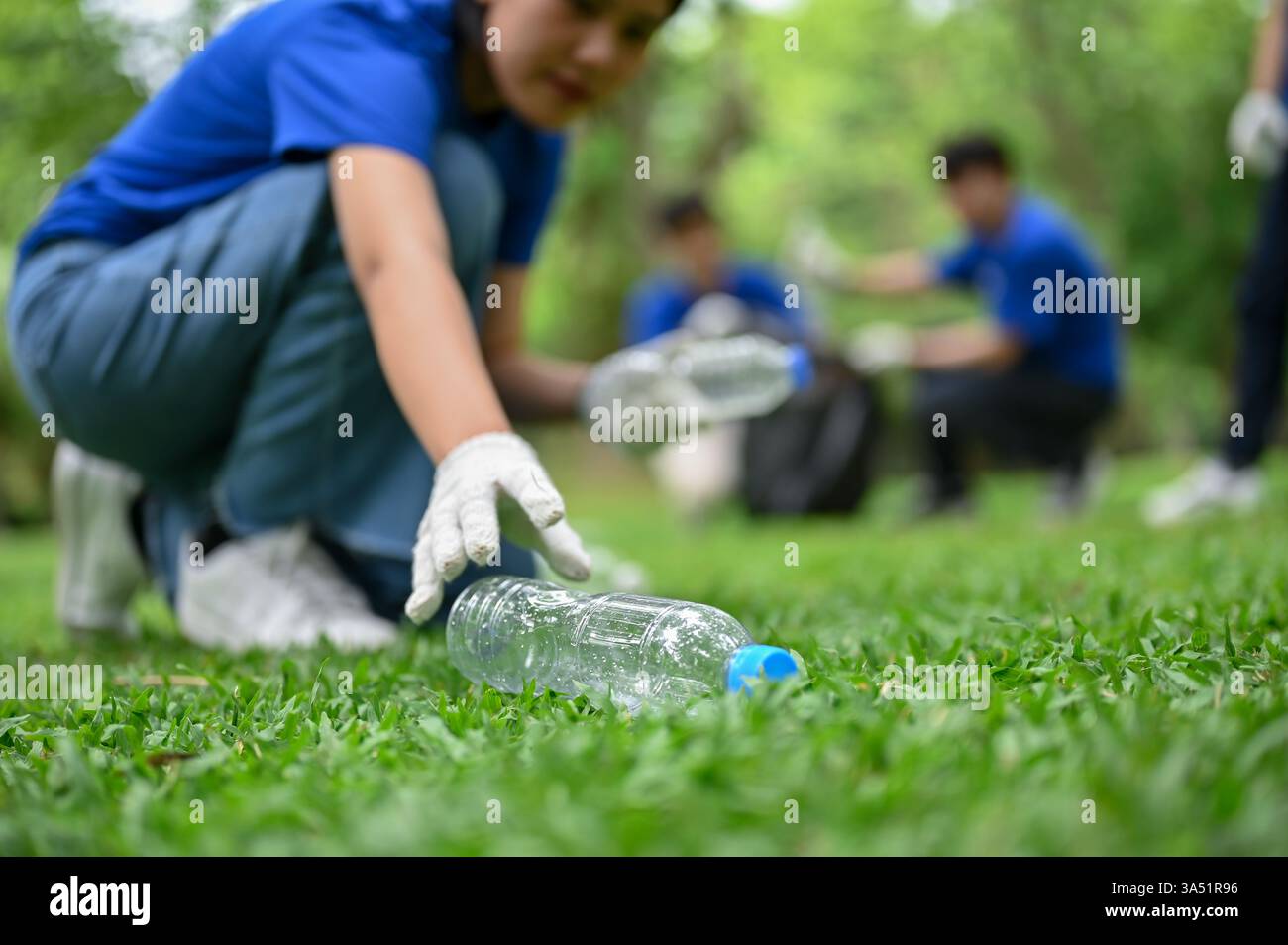 Close-up image of a beautiful and kind young Asian female volunteer ...