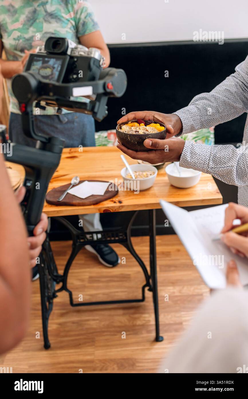 African American male with healthy breakfast for a cooking video ...