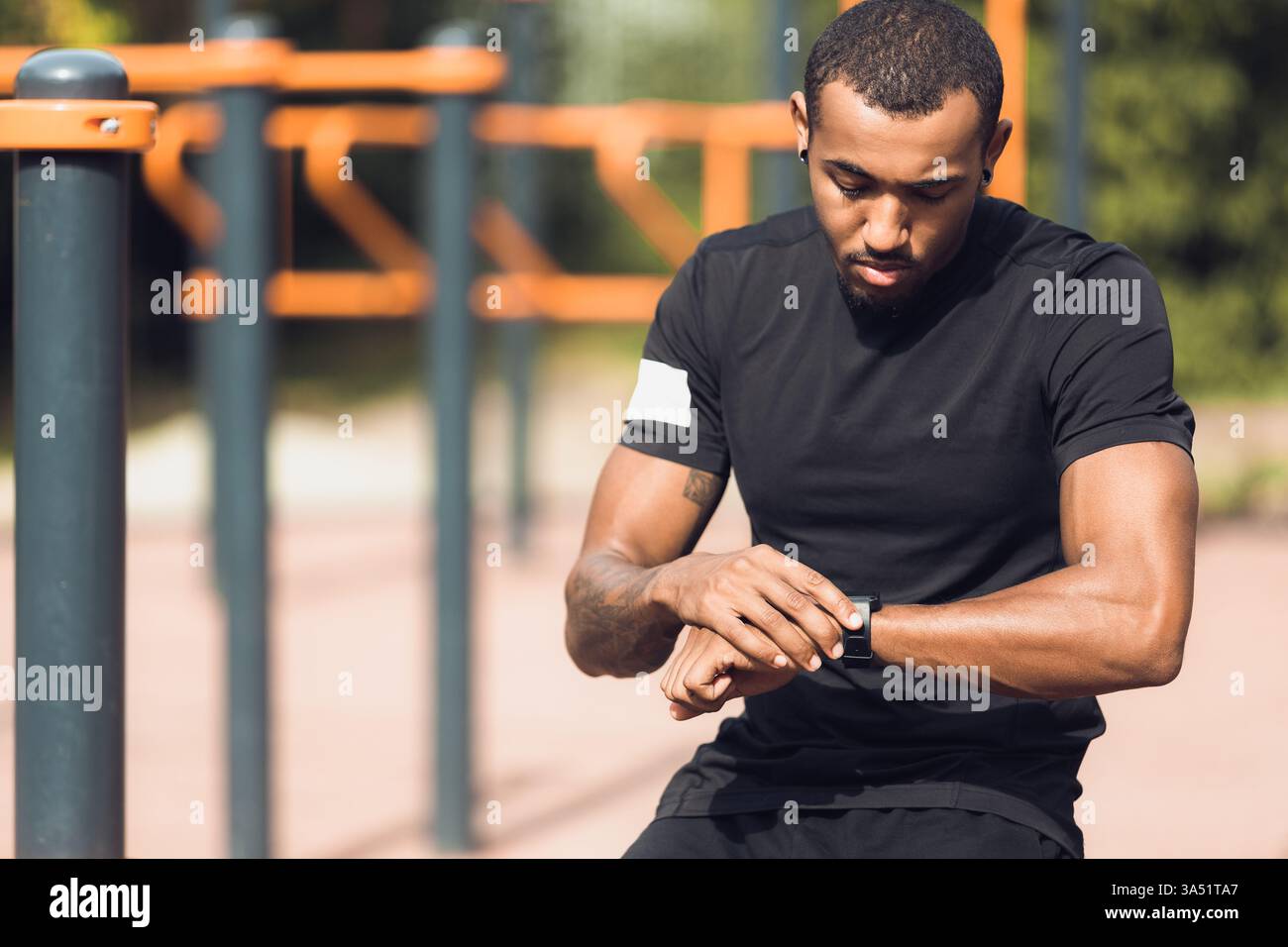 Sporty Man Checking His Performance On Fitness Smartwatch After Workout ...