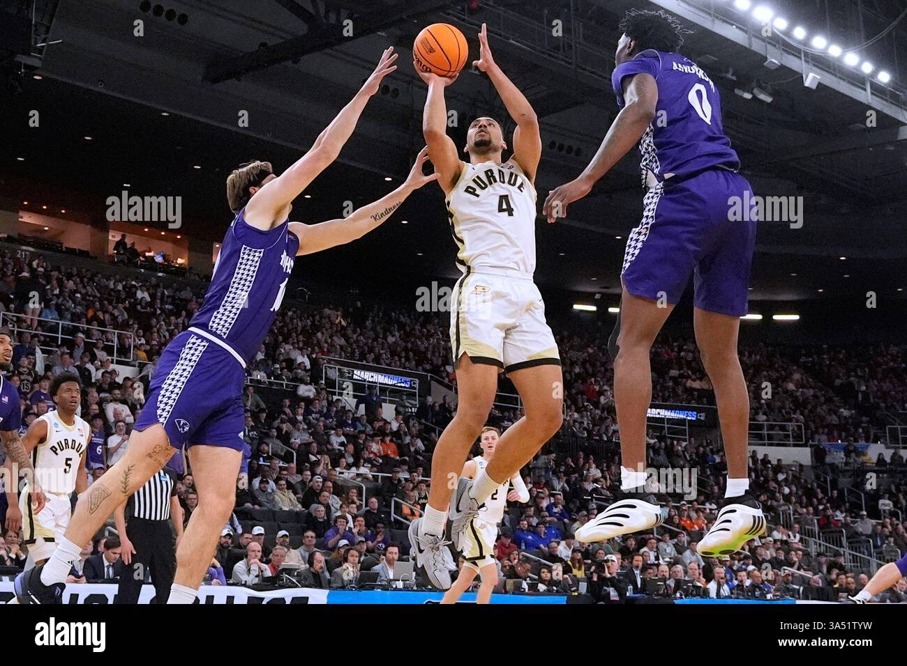 Purdue forward Trey Kaufman-Renn (4) drives to the basket against High ...