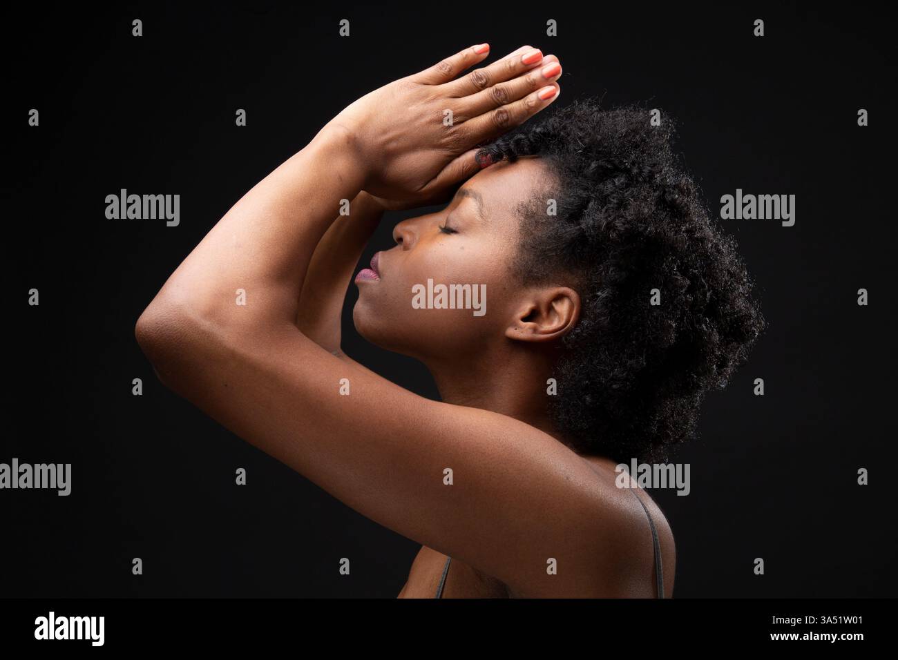 Woman praying hand over face hi-res stock photography and images - Alamy