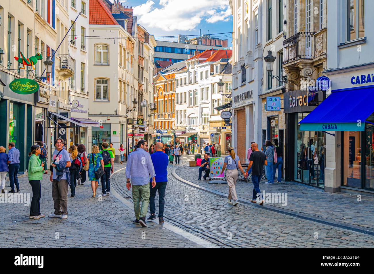 Brussels, Belgium, July 7, 2023: people tourists walking down ...