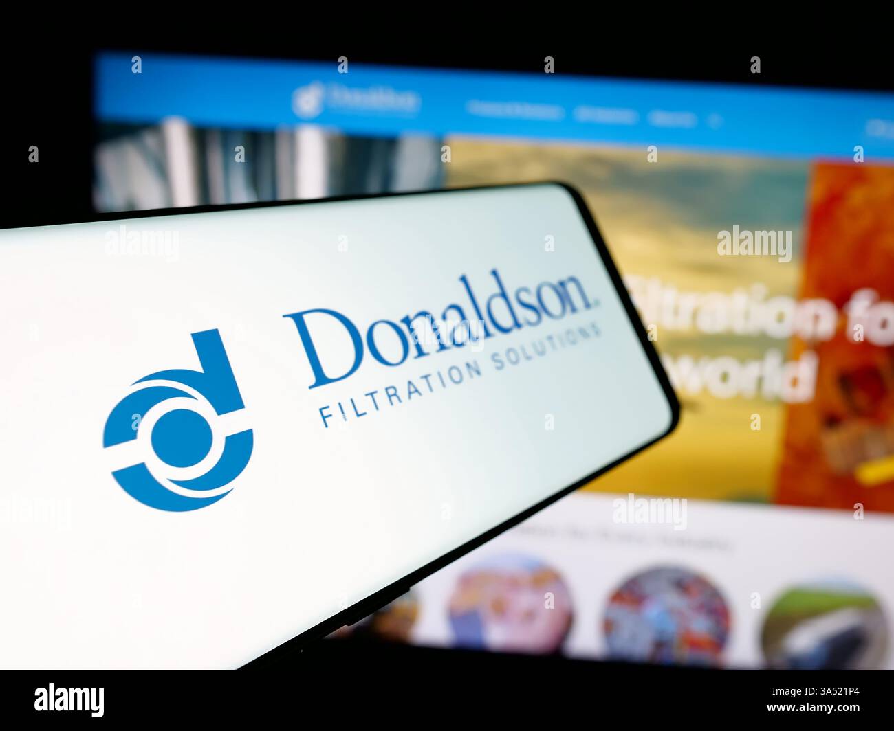 Mobile phone with logo of American filtration company Donaldson Company ...