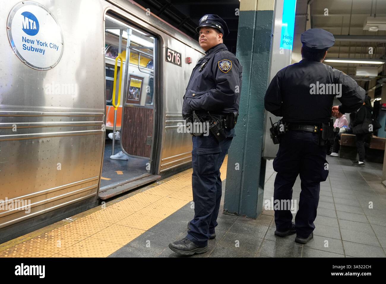 Police officers patrol in a subway station in New York, Thursday, March ...