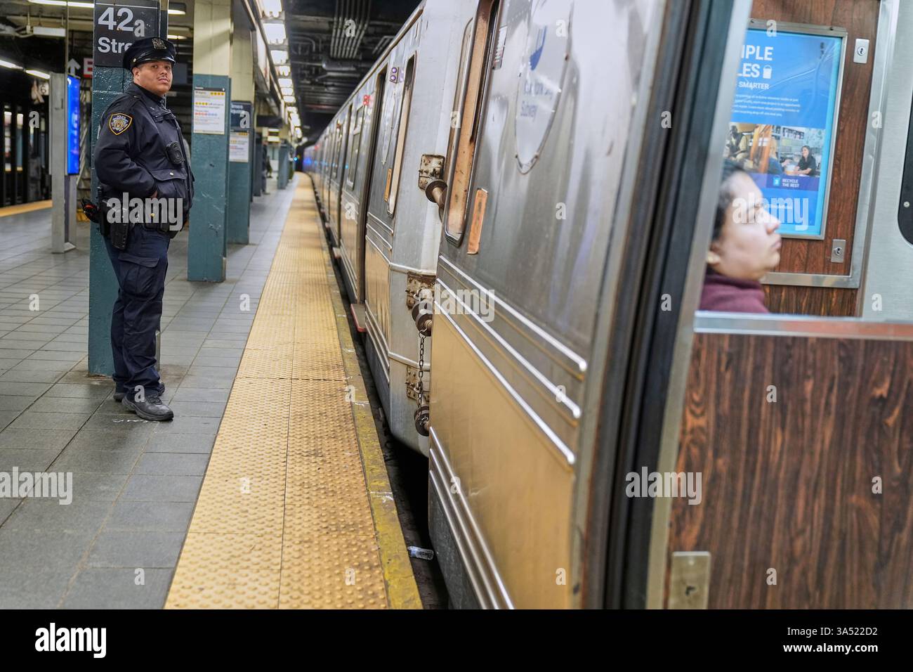 Police officers patrol in a subway station in New York, Thursday, March ...