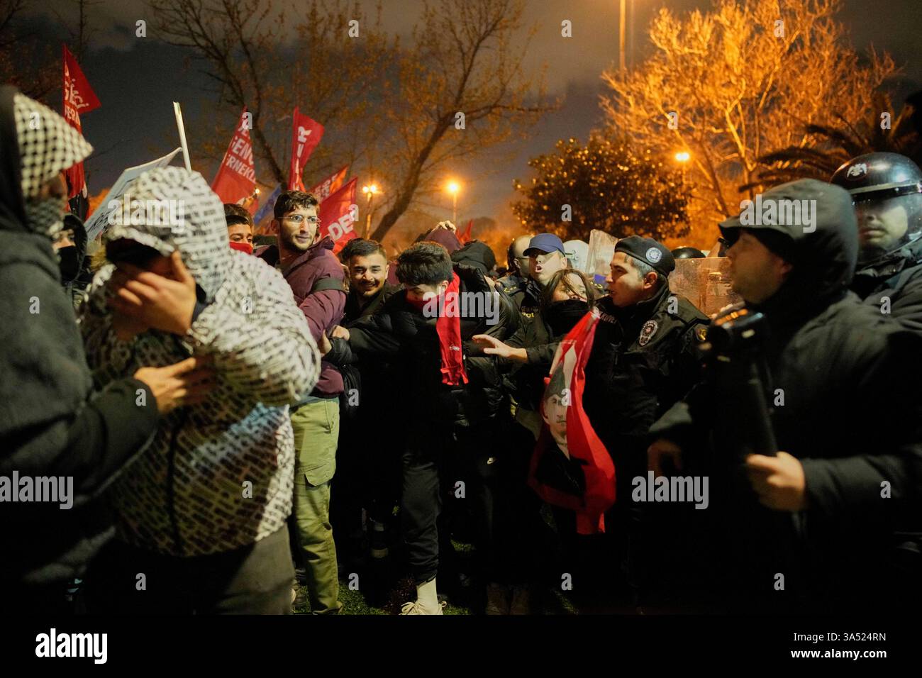 Police officers scuffle with people in Istanbul, Turkey, Thursday ...