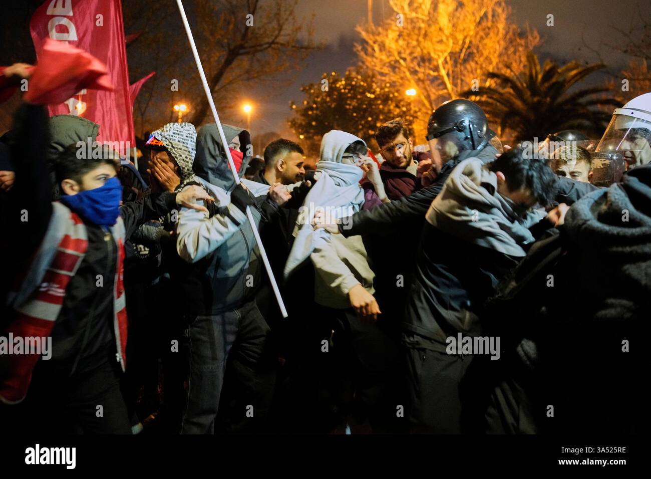 Police officers clash with people in Istanbul, Turkey, Thursday, March ...