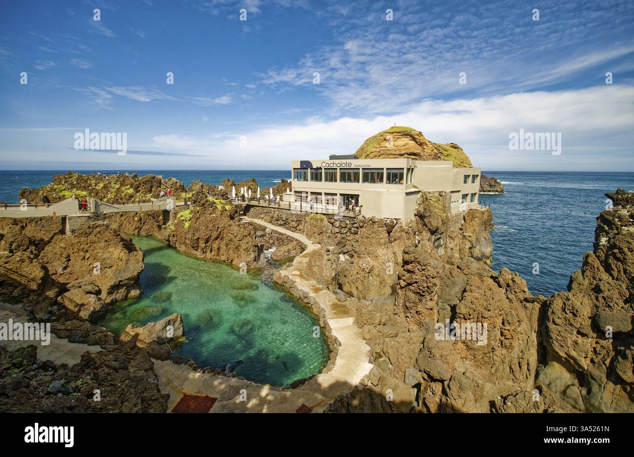 Natural swimming pools in volcanic rock, Cachalote restaurant, lava ...