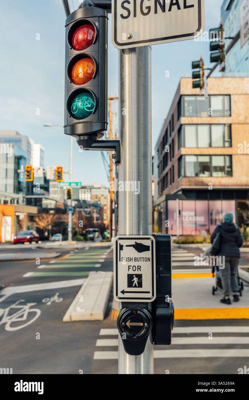 crosswalk with bike lane lights, walk signal Stock Photo - Alamy