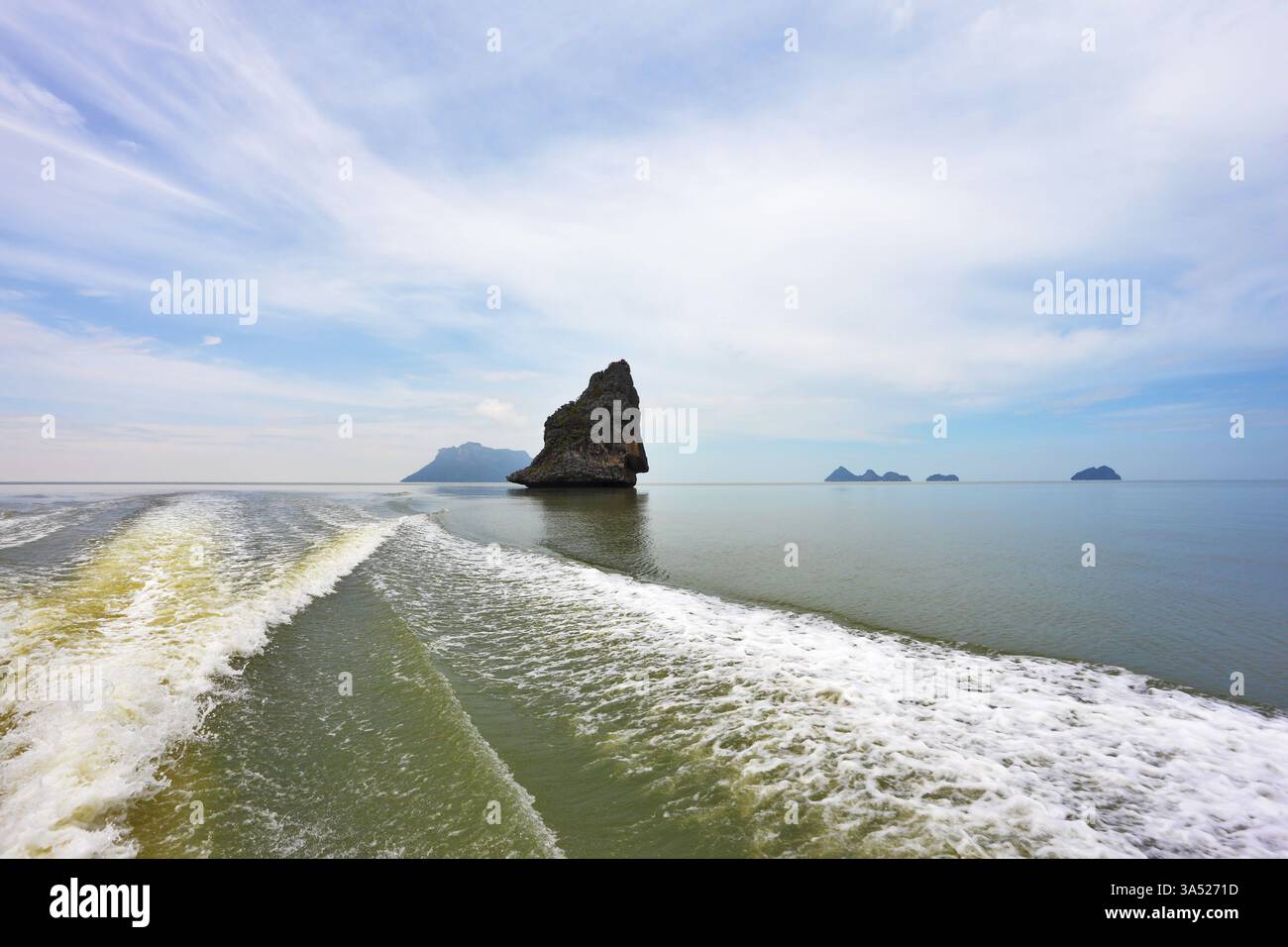 Boat trip in the Gulf of Thailand. The picturesque island-rock float in ...