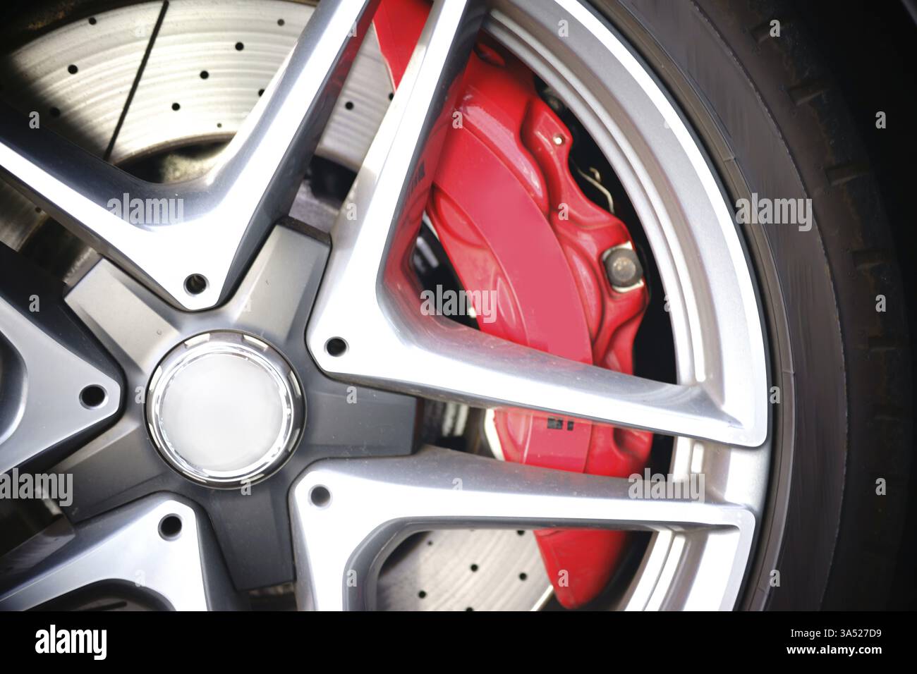 Close-up of the spoke rims of a sports car with brake discs Stock Photo ...