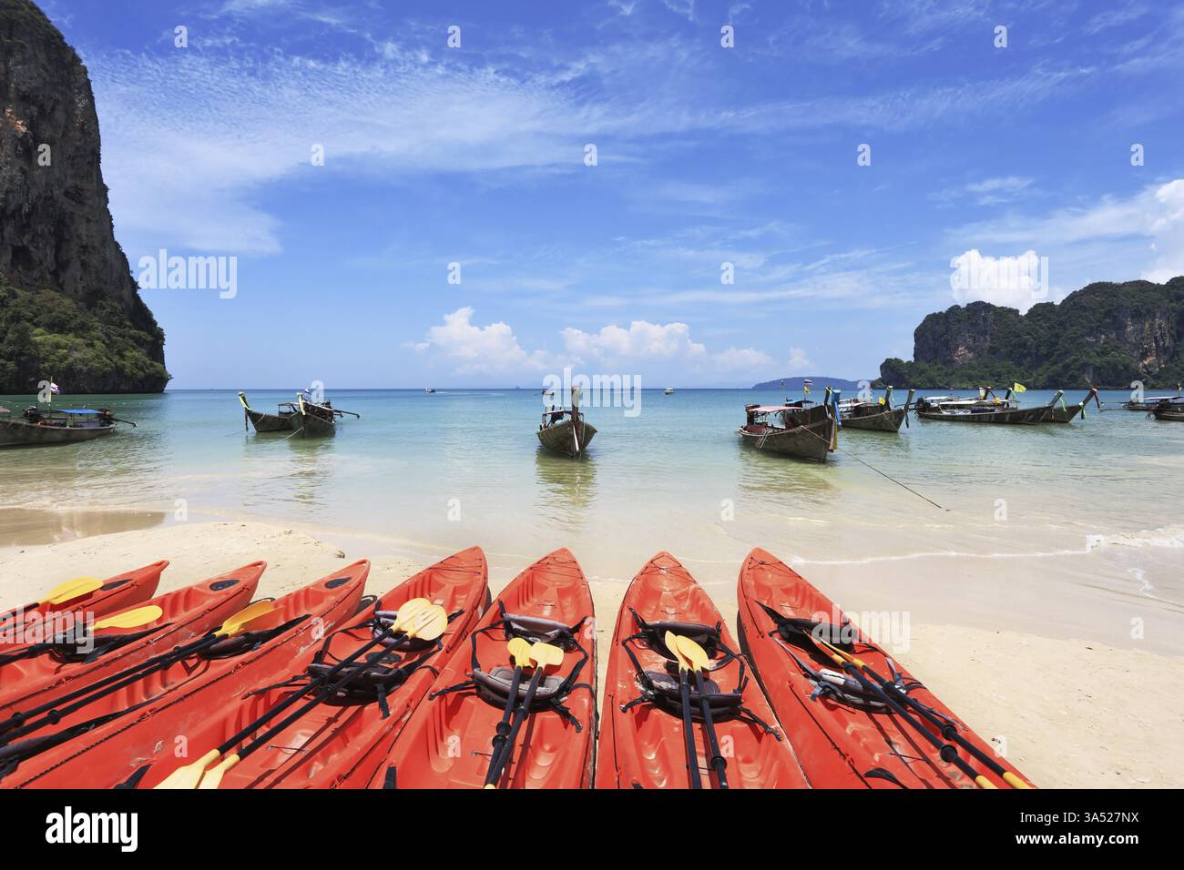 Red modern boats- canoes and boats classic Longtail awaiting tourists ...