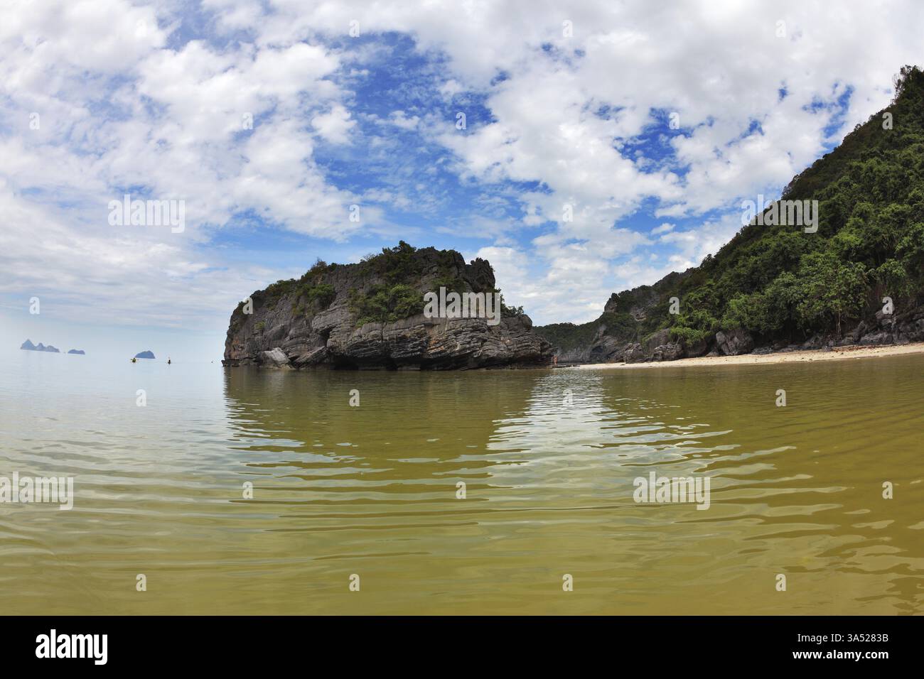 Shallow sandy beach. Picturesque bay in the Gulf of Thailand is ...