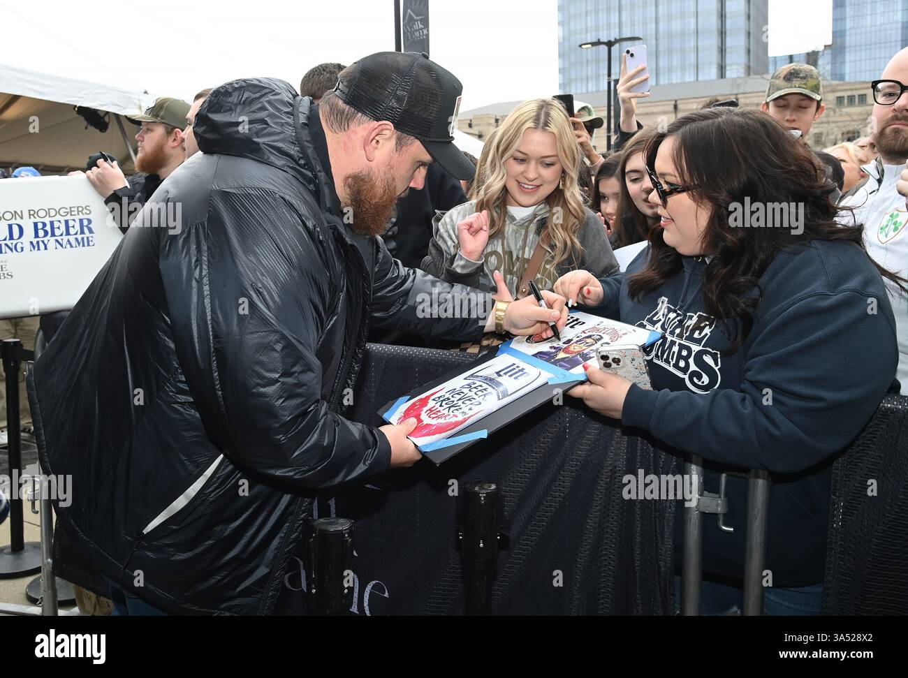Nashville, USA. 20th Mar, 2025. Luke Combs signing autographs for fans ...