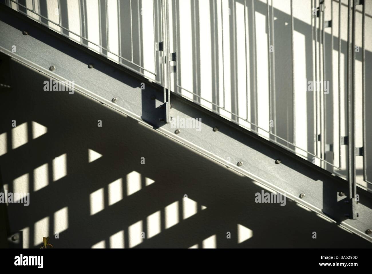 The facade of a residential building with an external staircase that ...