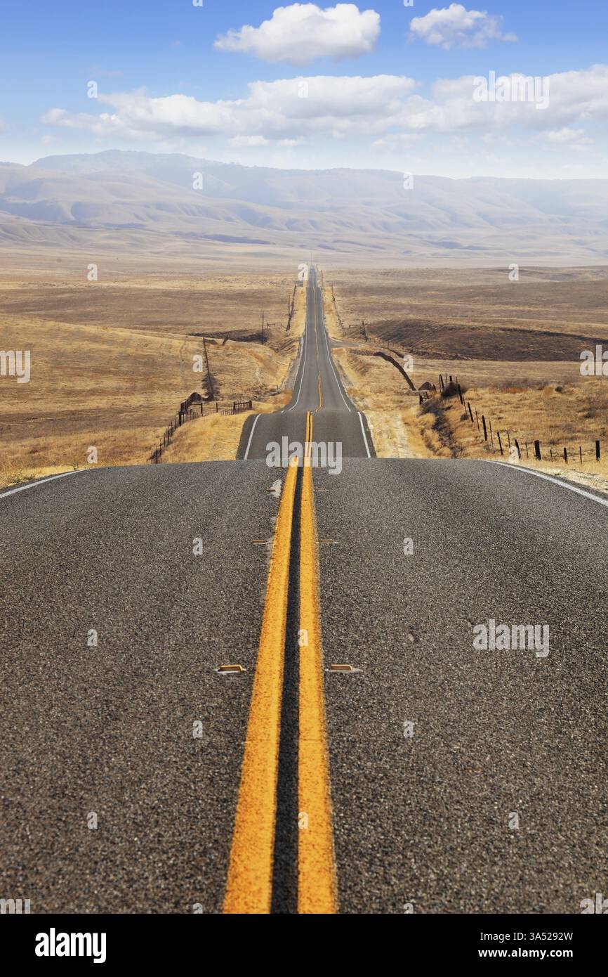 The road goes the distance. Perfectly smooth highway across the endless ...