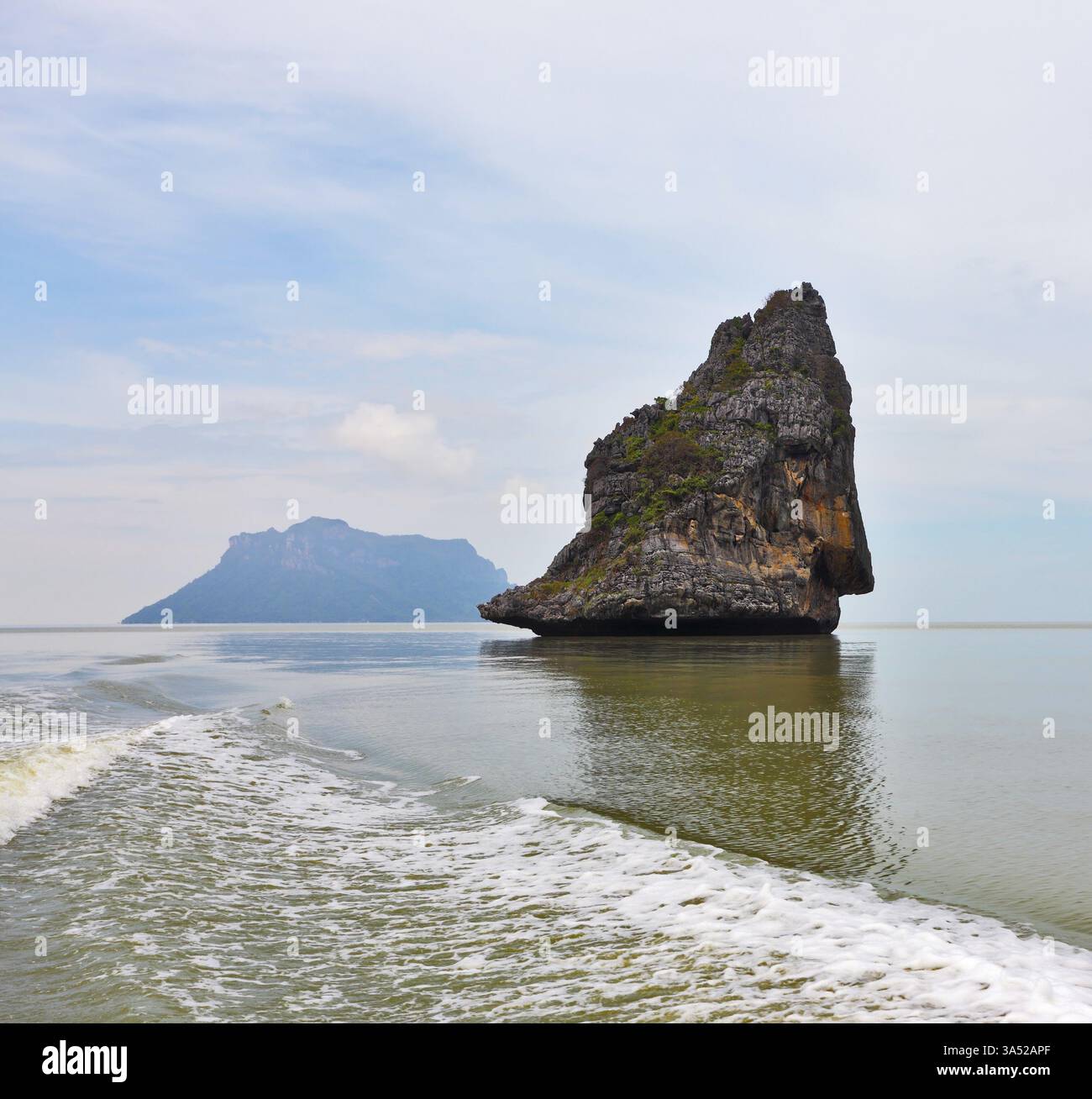 Boat trip in the Gulf of Thailand. The picturesque island-rock float in ...