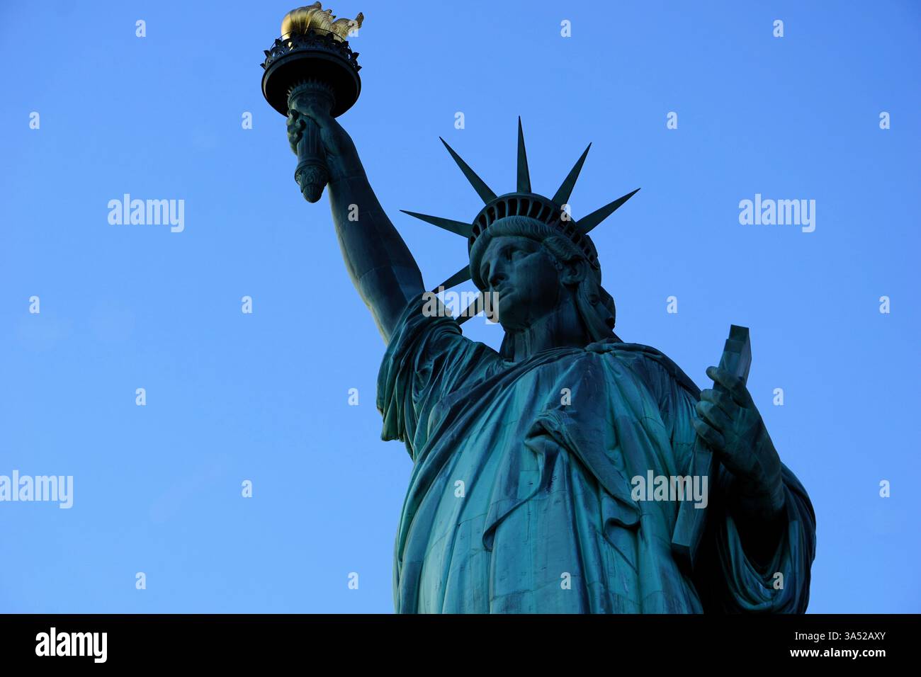 Iconic side profile close up of the landmark Statue of Liberty of ...