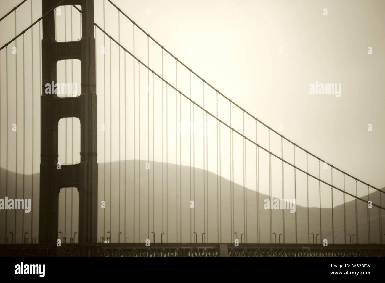 The vintage photograph of a pillar of the Golden Gate Bridge in hazy ...