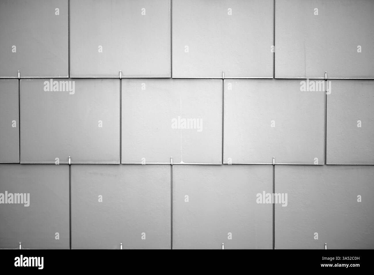 The facade of a building with wall panelling made of plastic panels ...